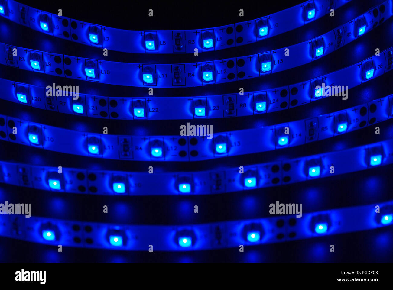Blue led strip on the black background Stock Photo - Alamy