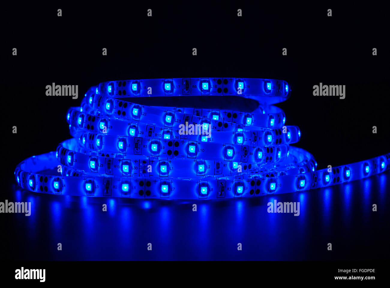 Blue led strip on the black background Stock Photo - Alamy