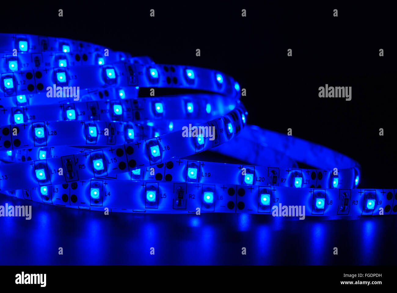 Blue led strip on the black background Stock Photo - Alamy