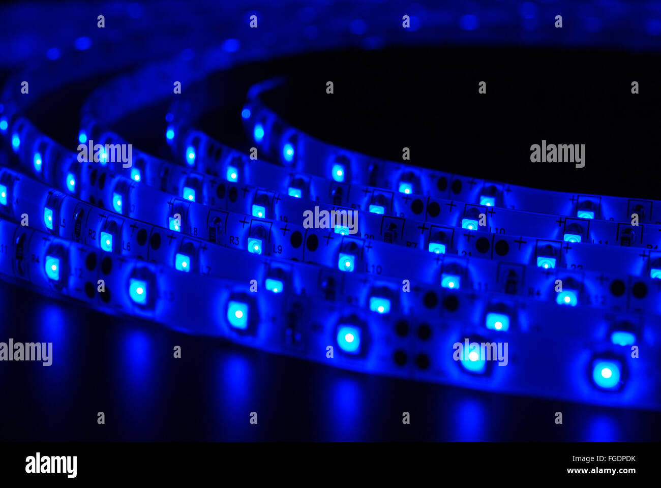 Blue led strip on the black background Stock Photo - Alamy