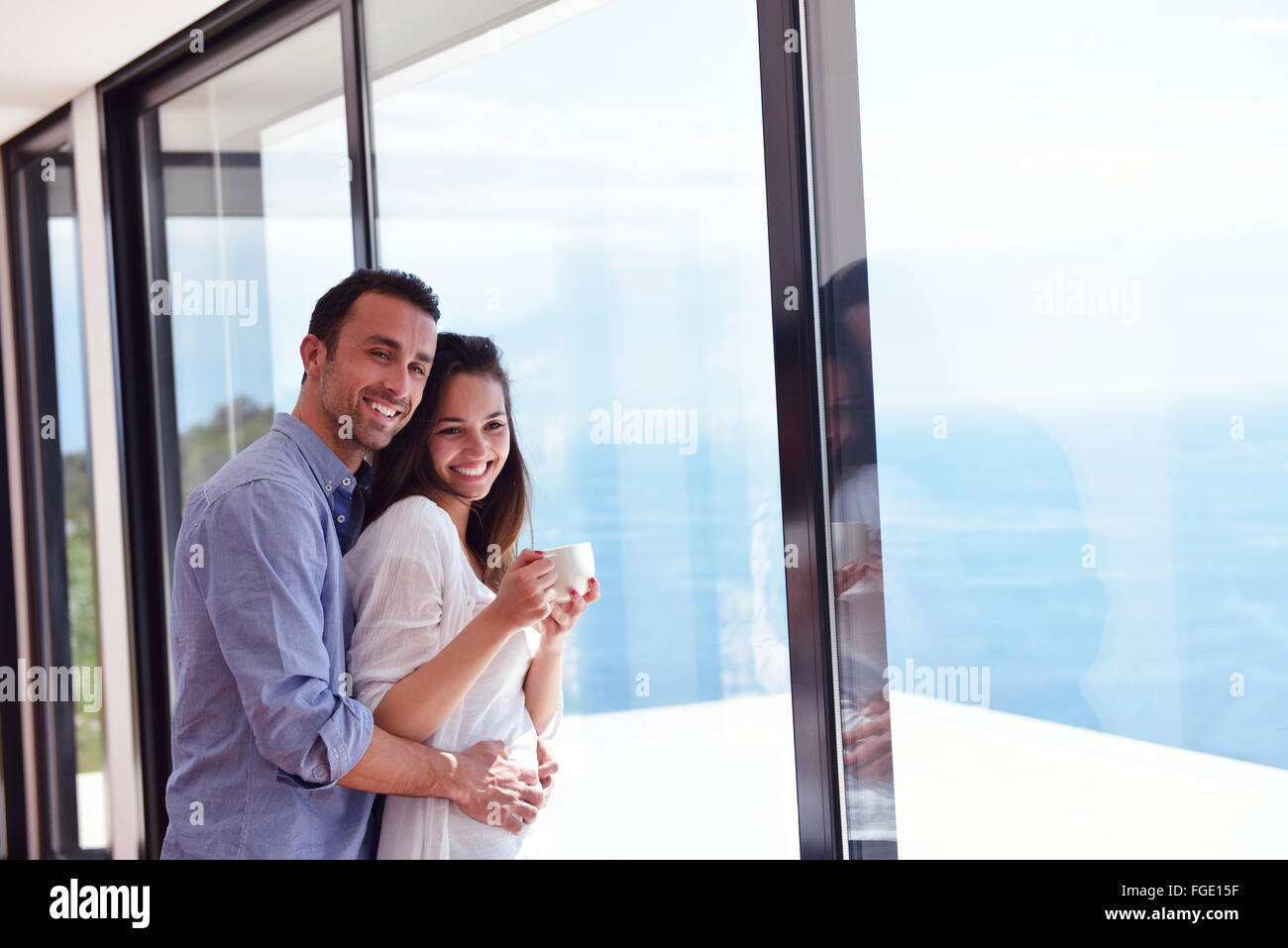relaxed young couple at home Stock Photo - Alamy