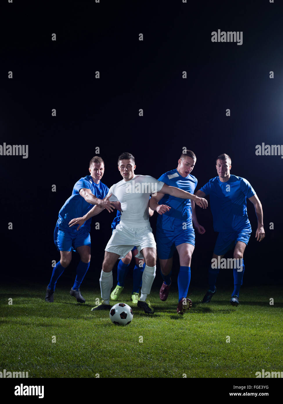 soccer players duel Stock Photo - Alamy
