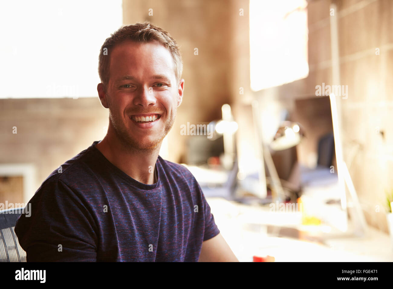 Portrait smiling designer working desk hi-res stock photography and ...