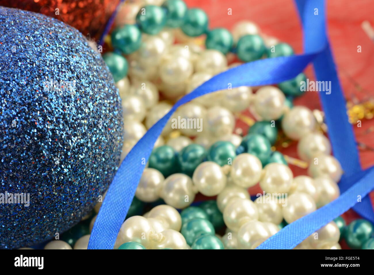 Christmas background with blue and white pearls Stock Photo - Alamy