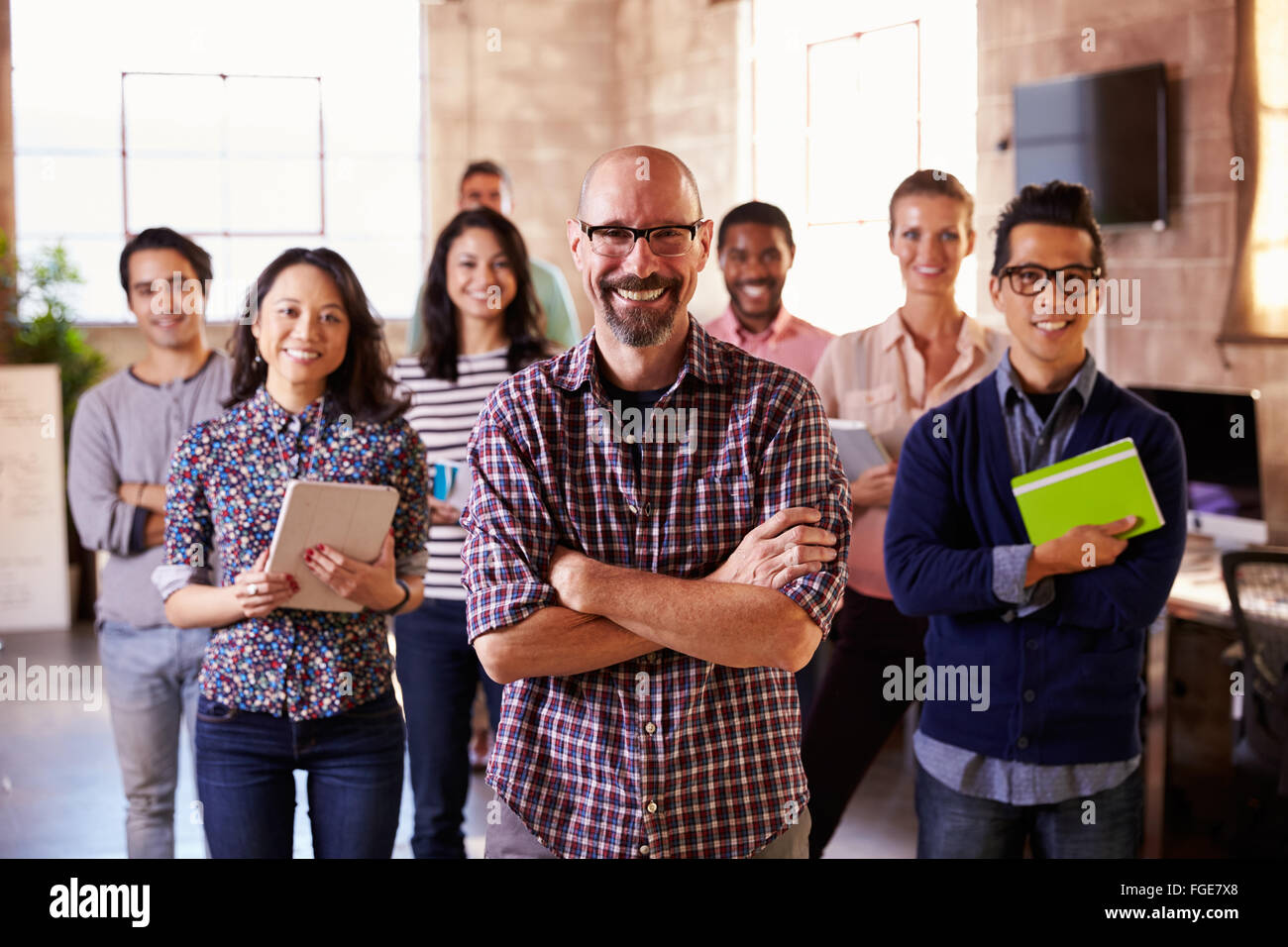 Portrait Of Staff Standing In Modern Design Office Stock Photo - Alamy