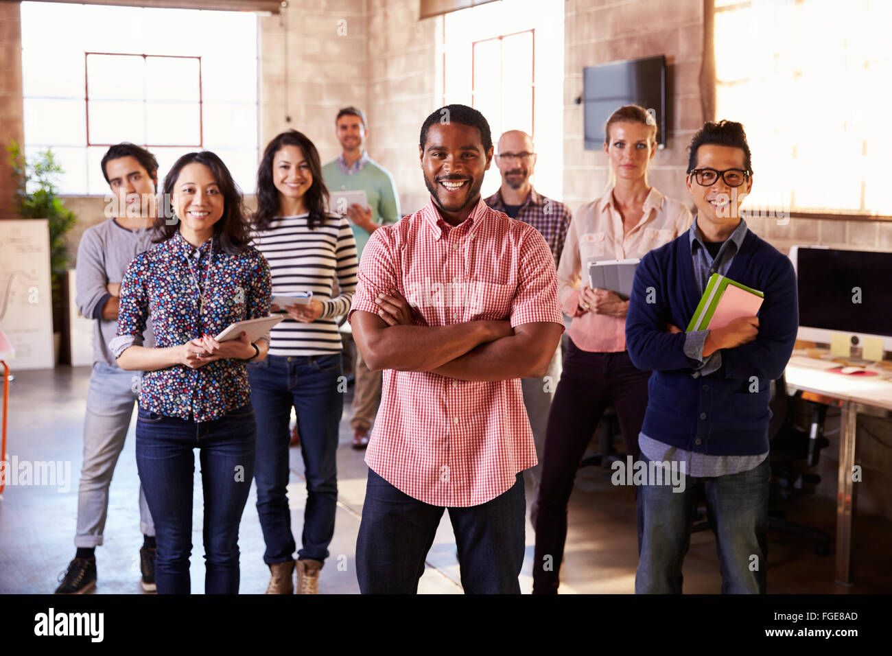 Portrait Of Staff Standing In Modern Design Office Stock Photo - Alamy