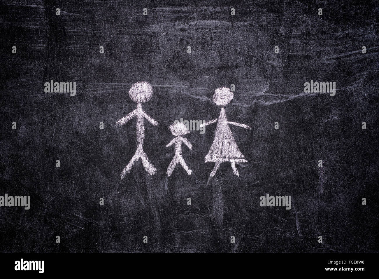 Family drawn on chalkboard. Close up Stock Photo - Alamy