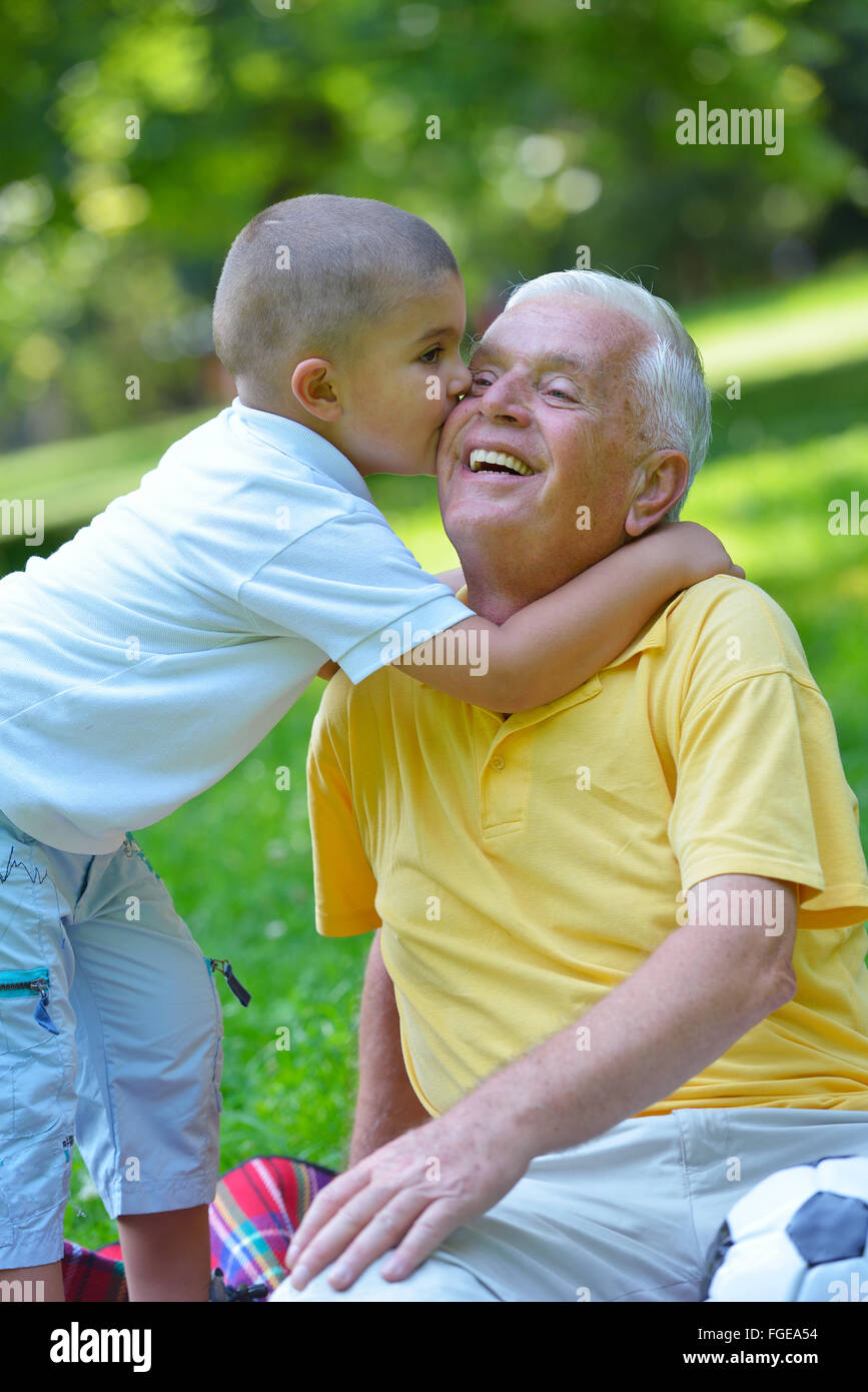happy grandfather and child in park Stock Photo - Alamy