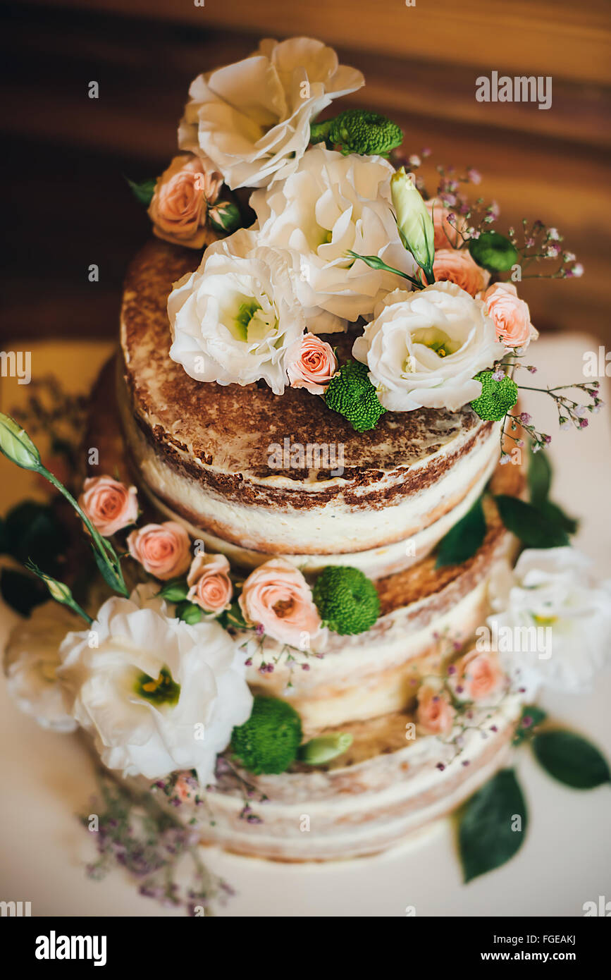 Wedding cake with roses whipped cream Stock Photo - Alamy