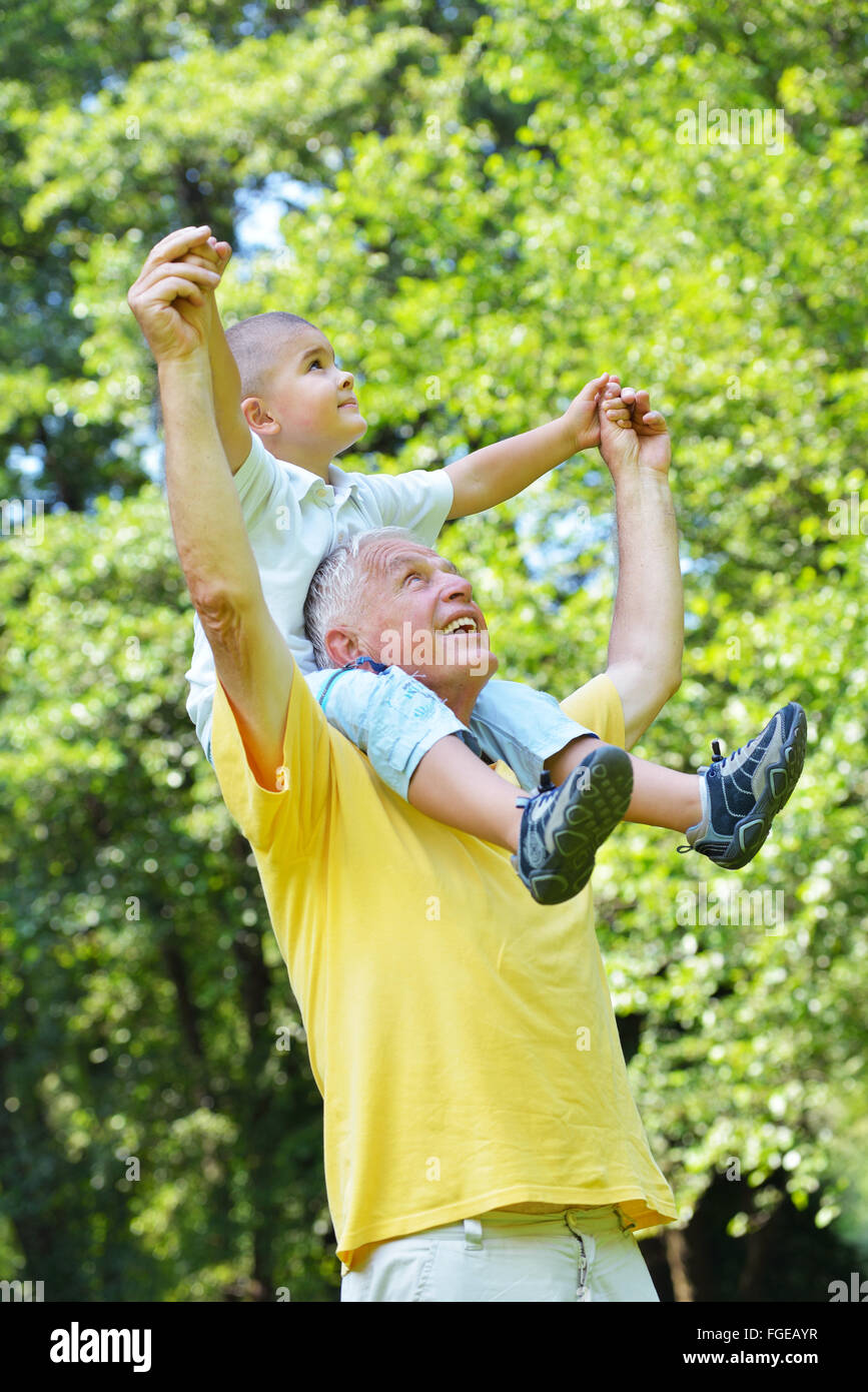 happy grandfather and child in park Stock Photo - Alamy