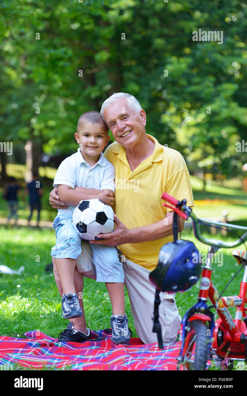 happy grandfather and child in park Stock Photo - Alamy