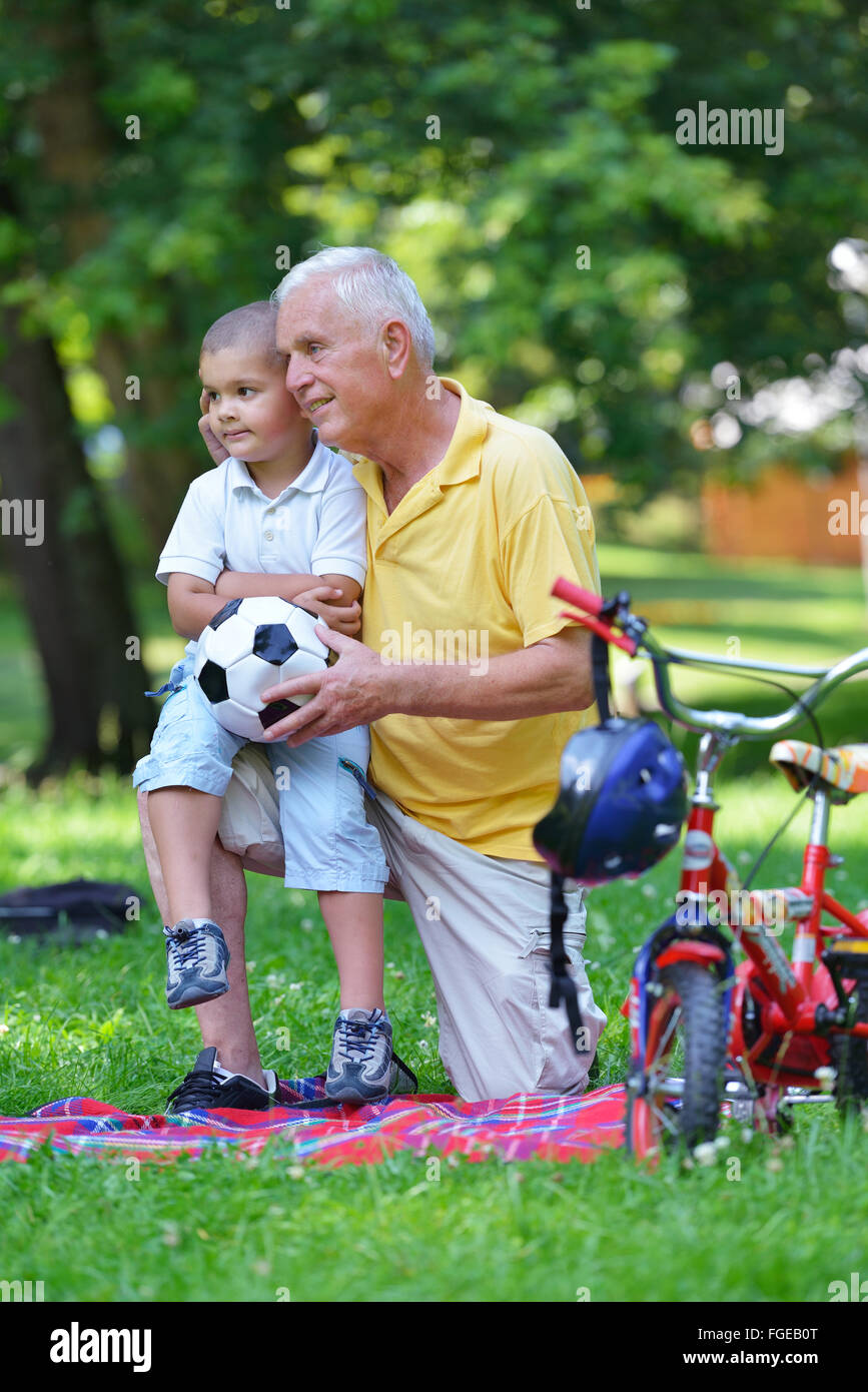 happy grandfather and child in park Stock Photo - Alamy