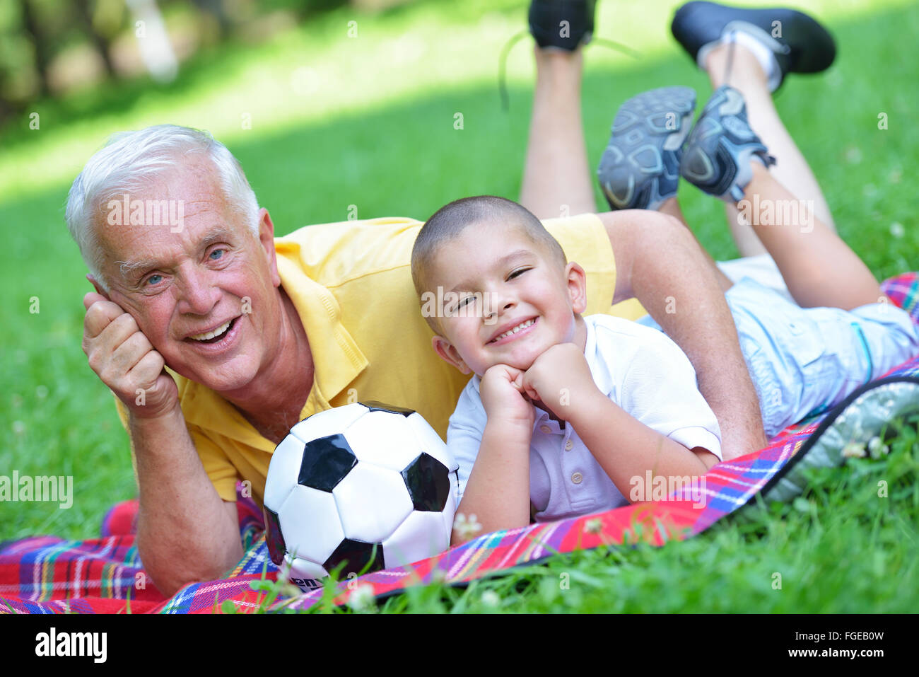 happy grandfather and child in park Stock Photo - Alamy