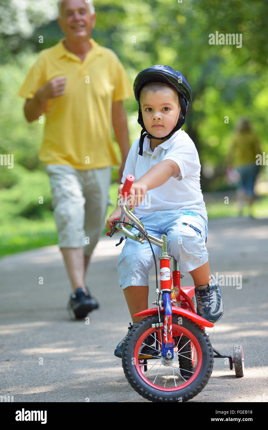 happy grandfather and child in park Stock Photo - Alamy