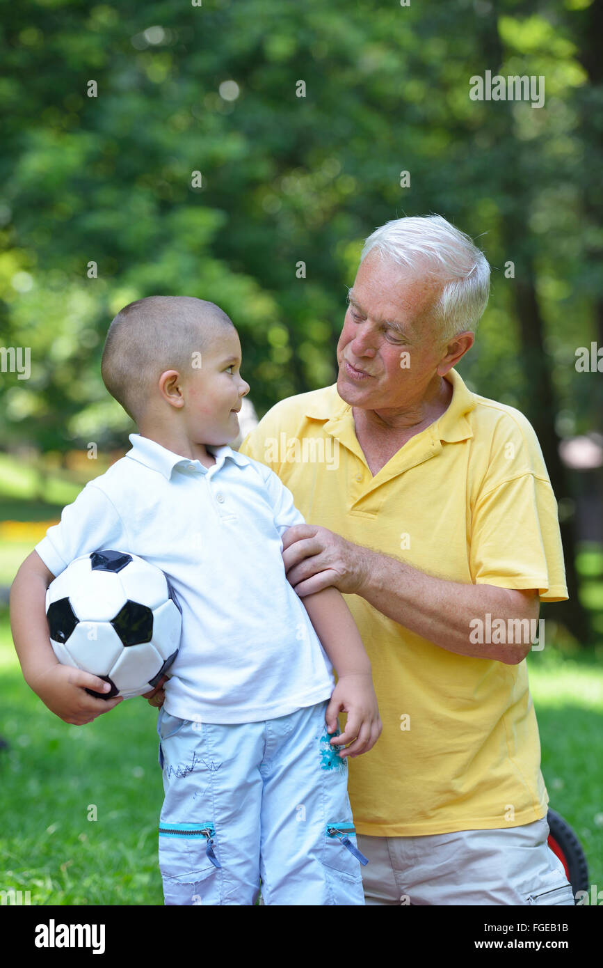 happy grandfather and child in park Stock Photo - Alamy