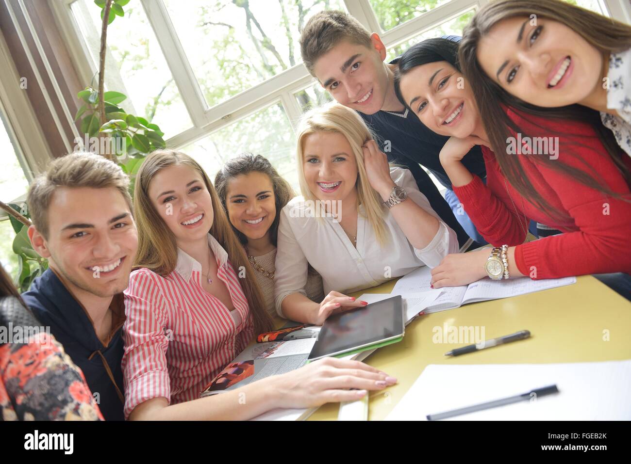 teens group in school Stock Photo - Alamy