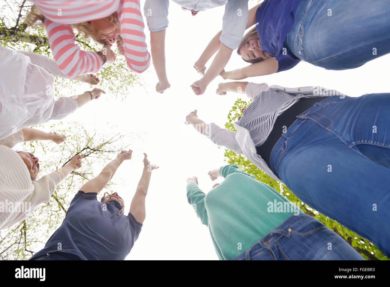 young friends staying together outdoor in the park Stock Photo - Alamy