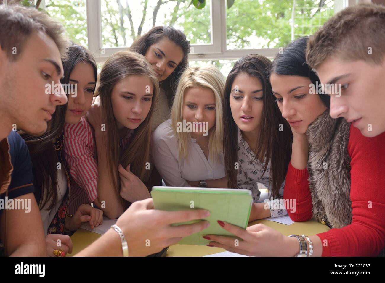teens group in school Stock Photo - Alamy