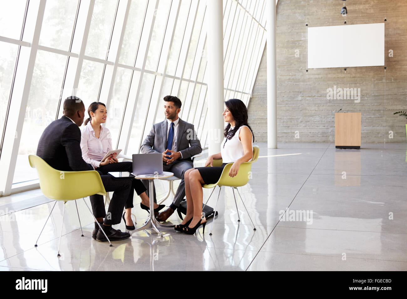 Group Business Meeting In Reception Of Modern Office Stock Photo - Alamy