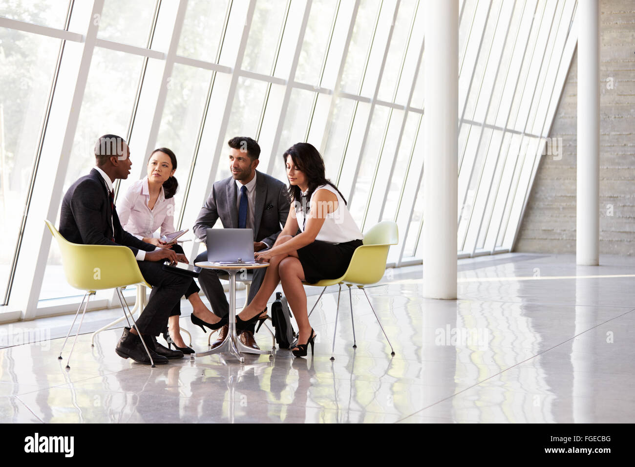 Group Business Meeting In Reception Of Modern Office Stock Photo - Alamy