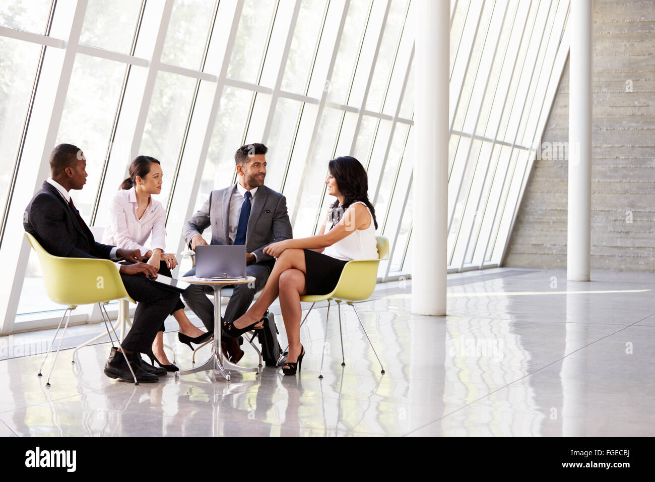 Group Business Meeting In Reception Of Modern Office Stock Photo - Alamy