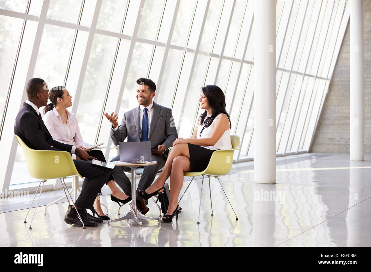 Group Business Meeting In Reception Of Modern Office Stock Photo - Alamy