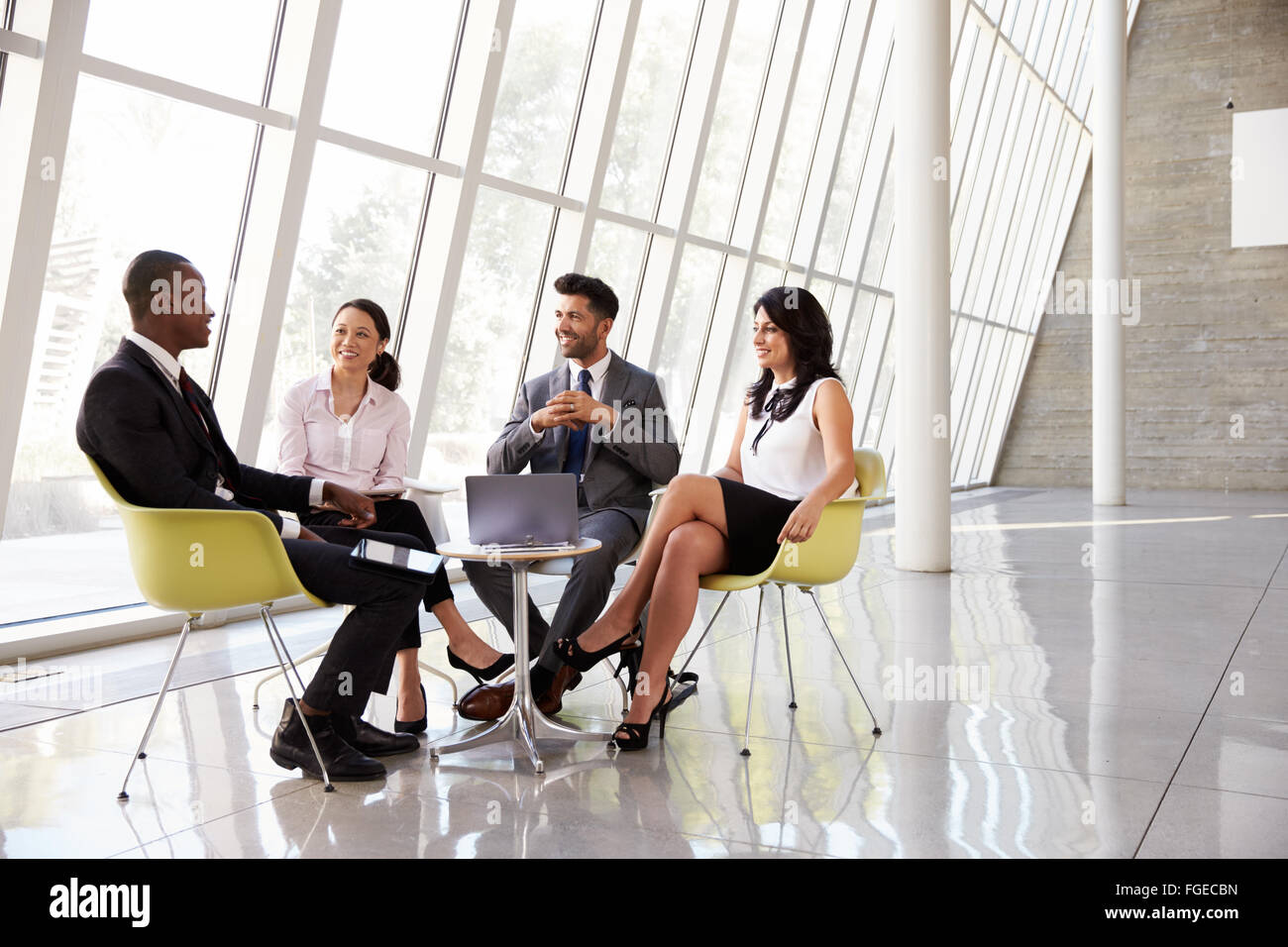 Group Business Meeting In Reception Of Modern Office Stock Photo - Alamy