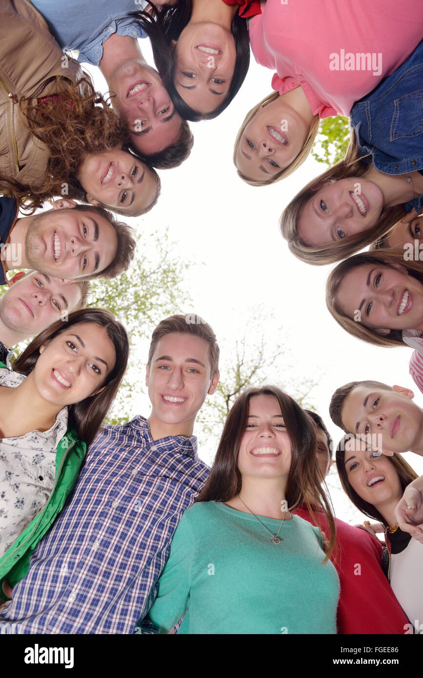 young friends staying together outdoor in the park Stock Photo - Alamy