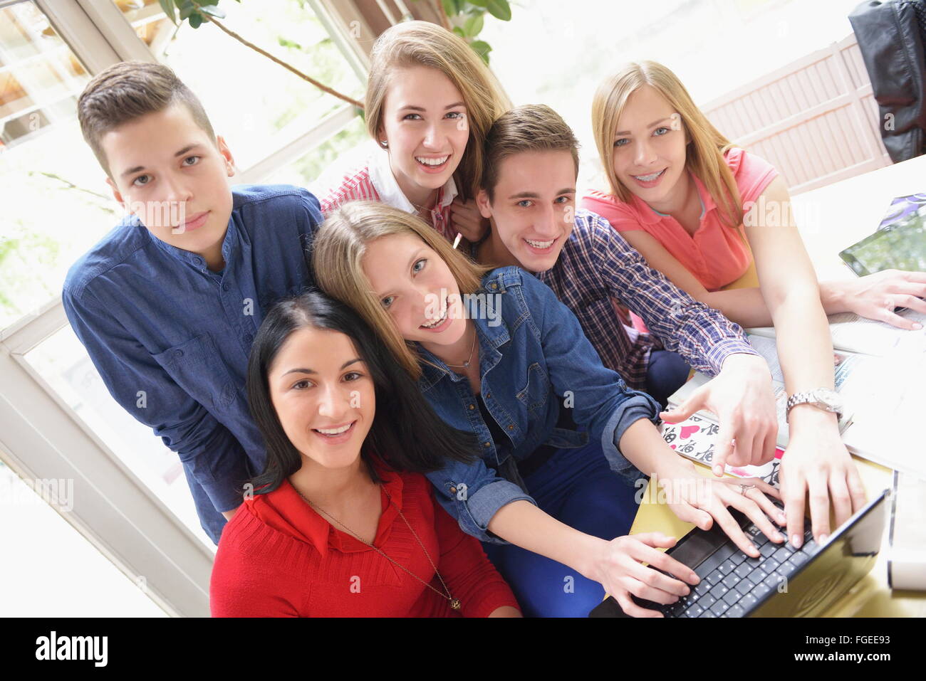 happy teens group in school Stock Photo - Alamy