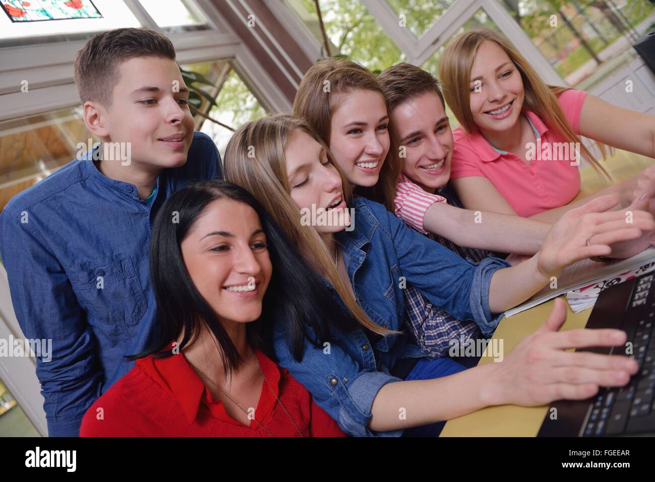 happy teens group in school Stock Photo - Alamy