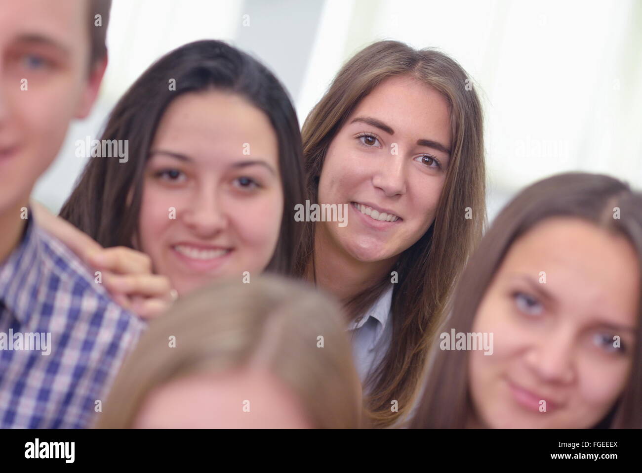happy teens group in school Stock Photo - Alamy