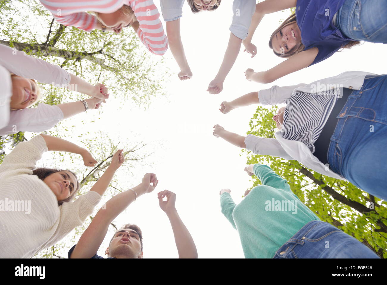 young friends staying together outdoor in the park Stock Photo - Alamy