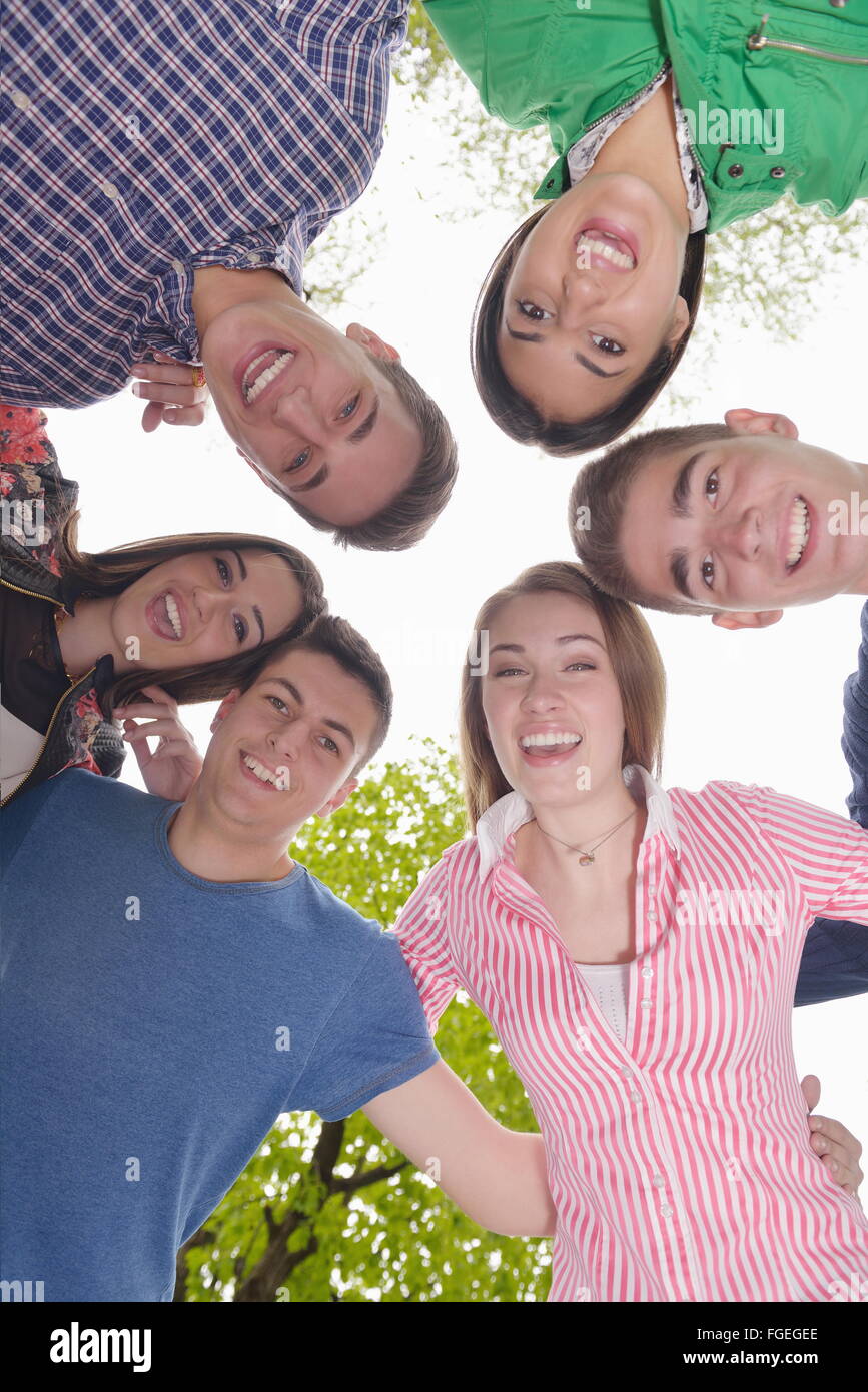 young friends staying together outdoor in the park Stock Photo - Alamy