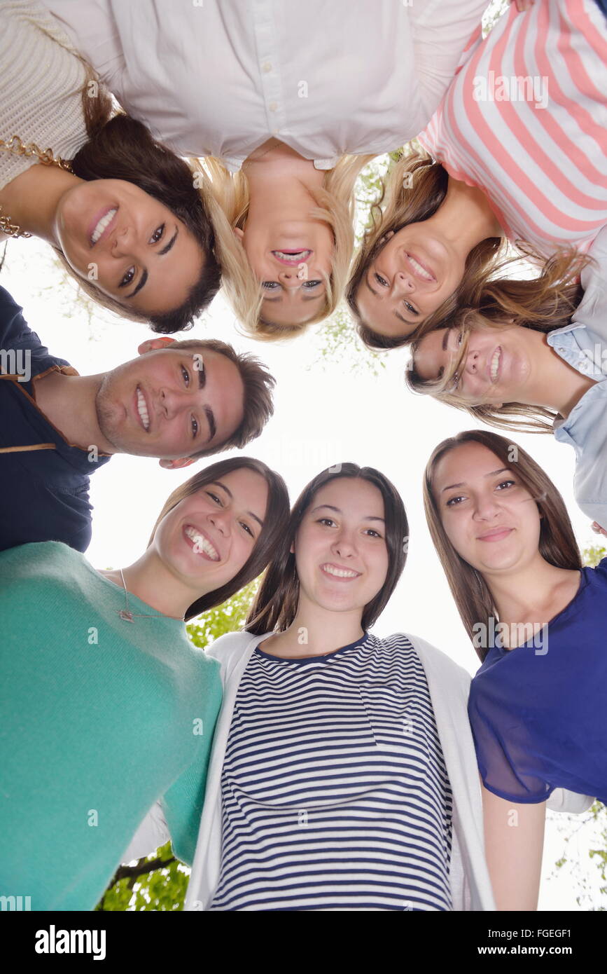 young friends staying together outdoor in the park Stock Photo - Alamy