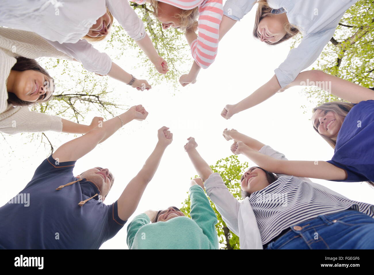 young friends staying together outdoor in the park Stock Photo - Alamy