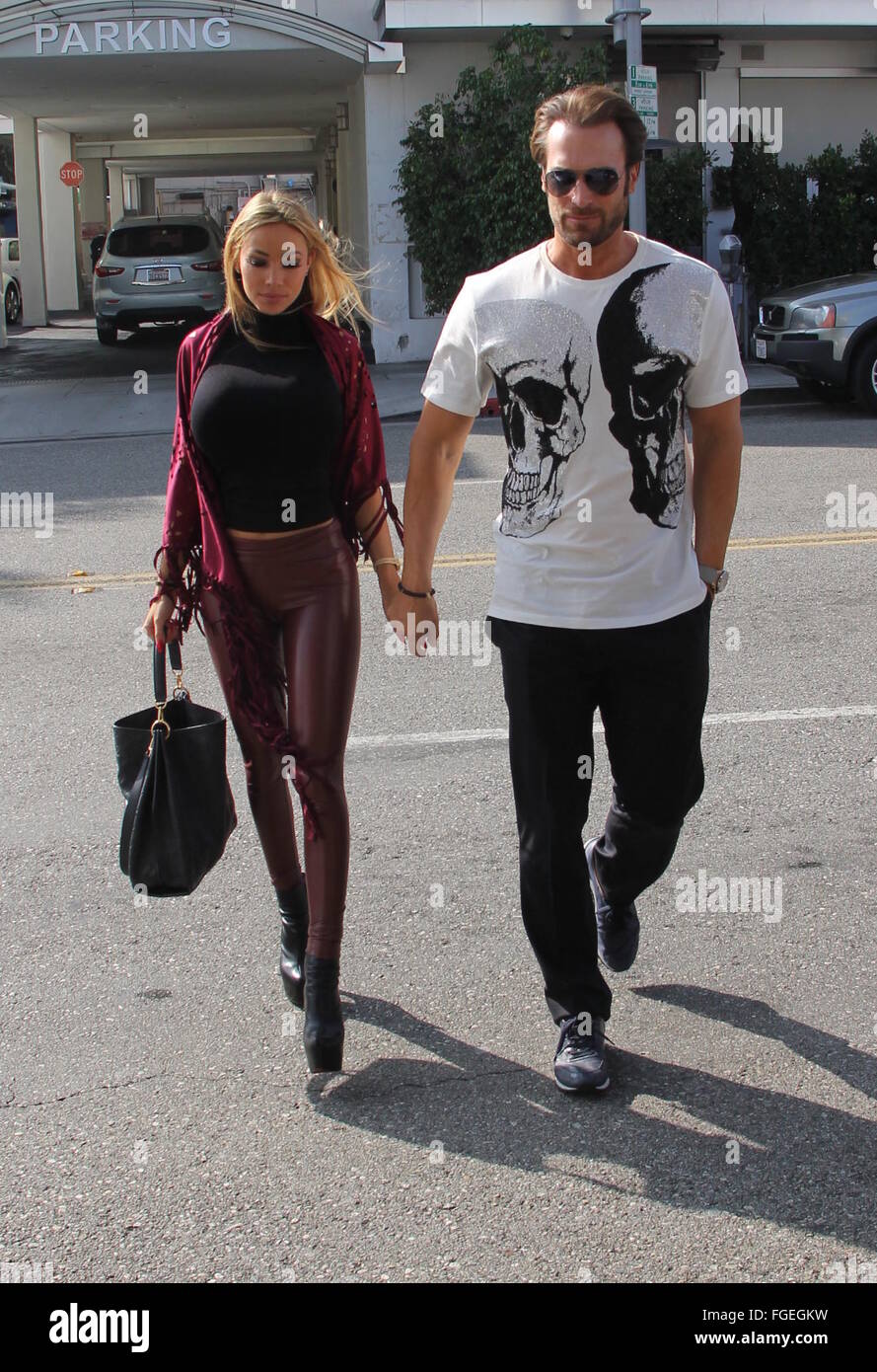 German millionaires Maria and Bastian Yotta share a kiss out in Beverly ...