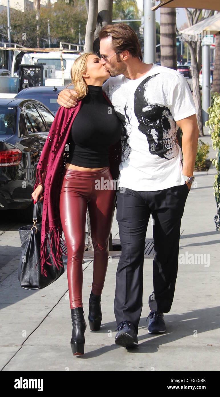 German millionaires Maria and Bastian Yotta share a kiss out in Beverly ...