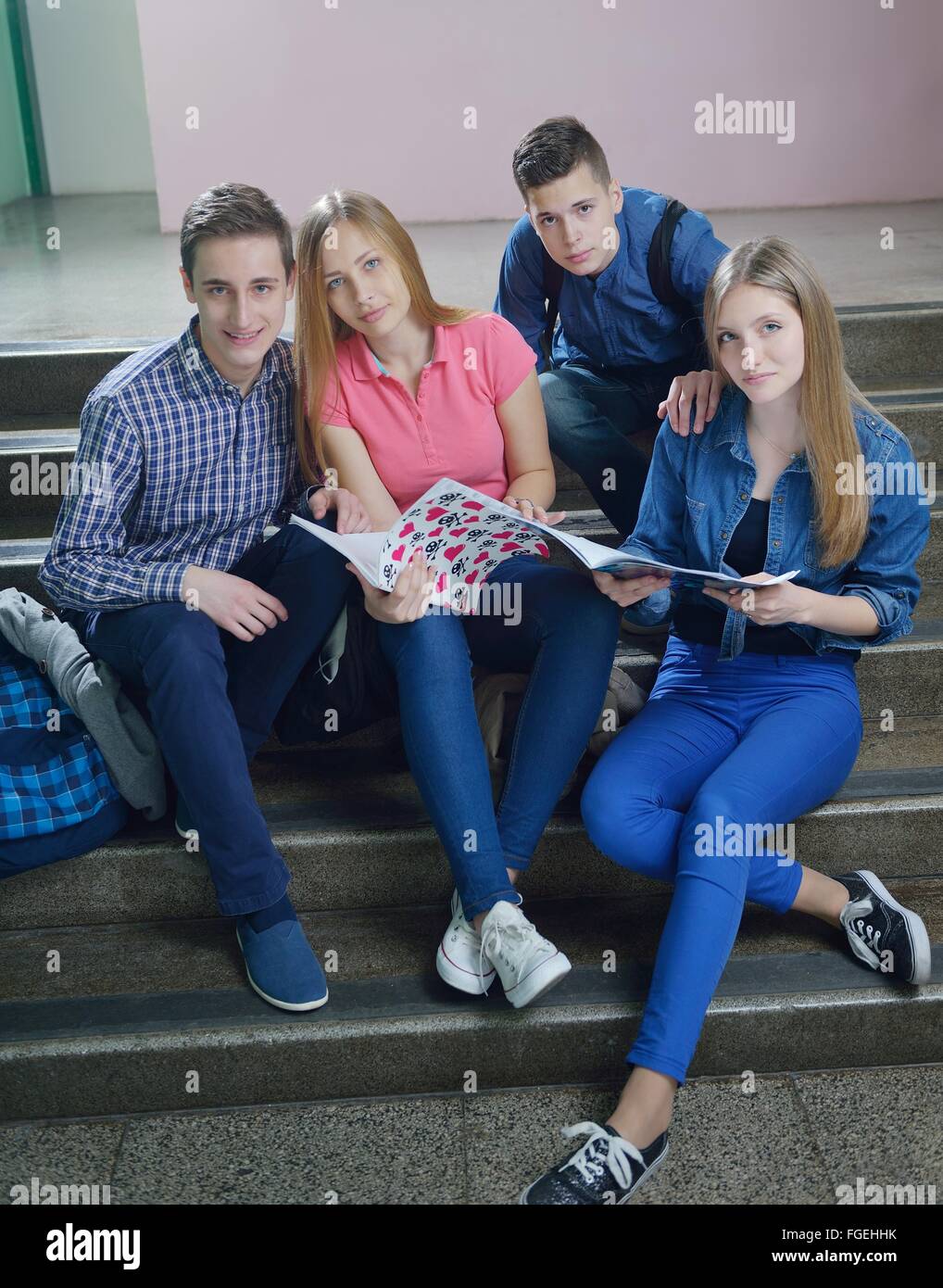 happy teens group in school Stock Photo - Alamy