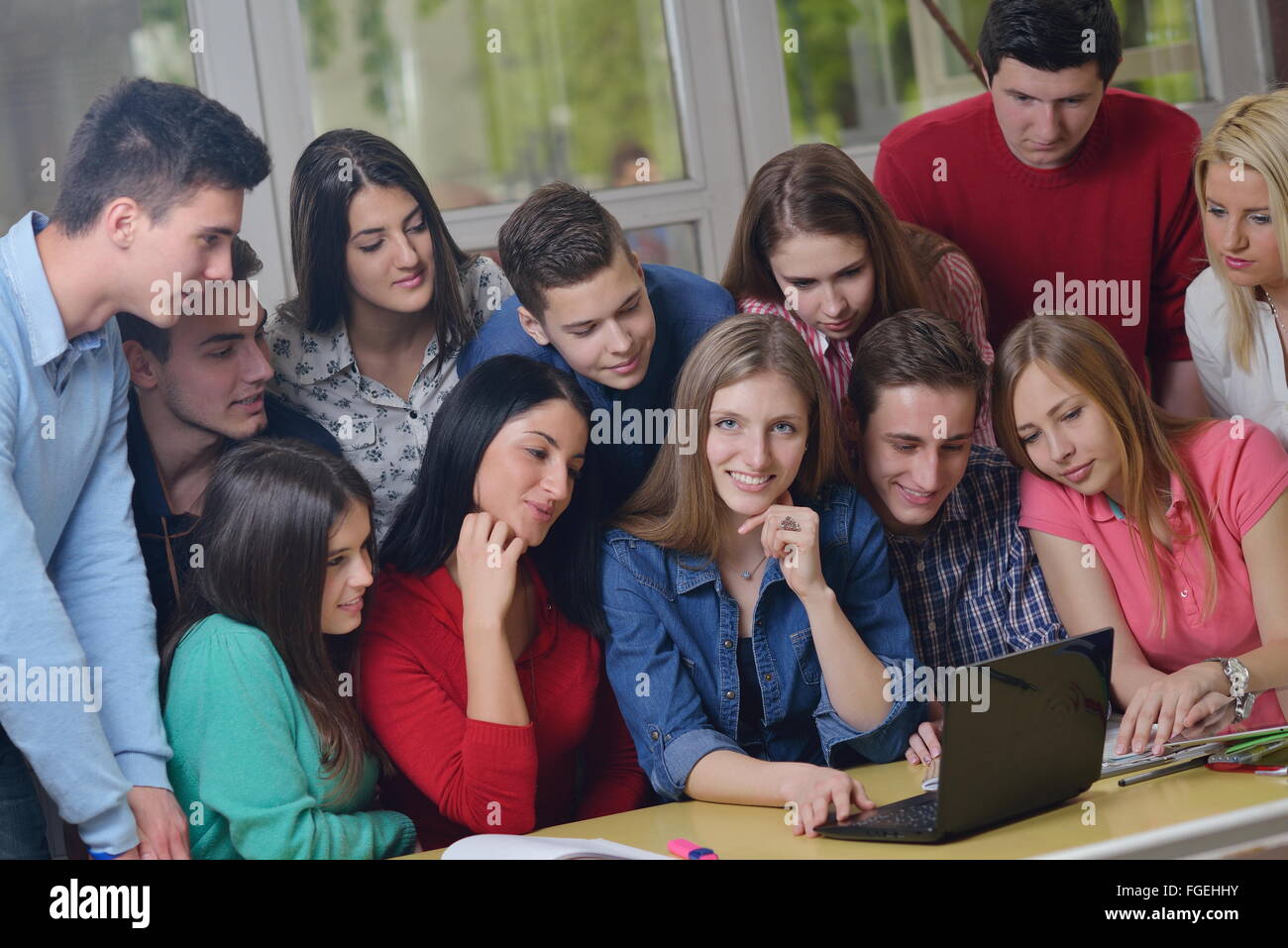 happy teens group in school Stock Photo - Alamy