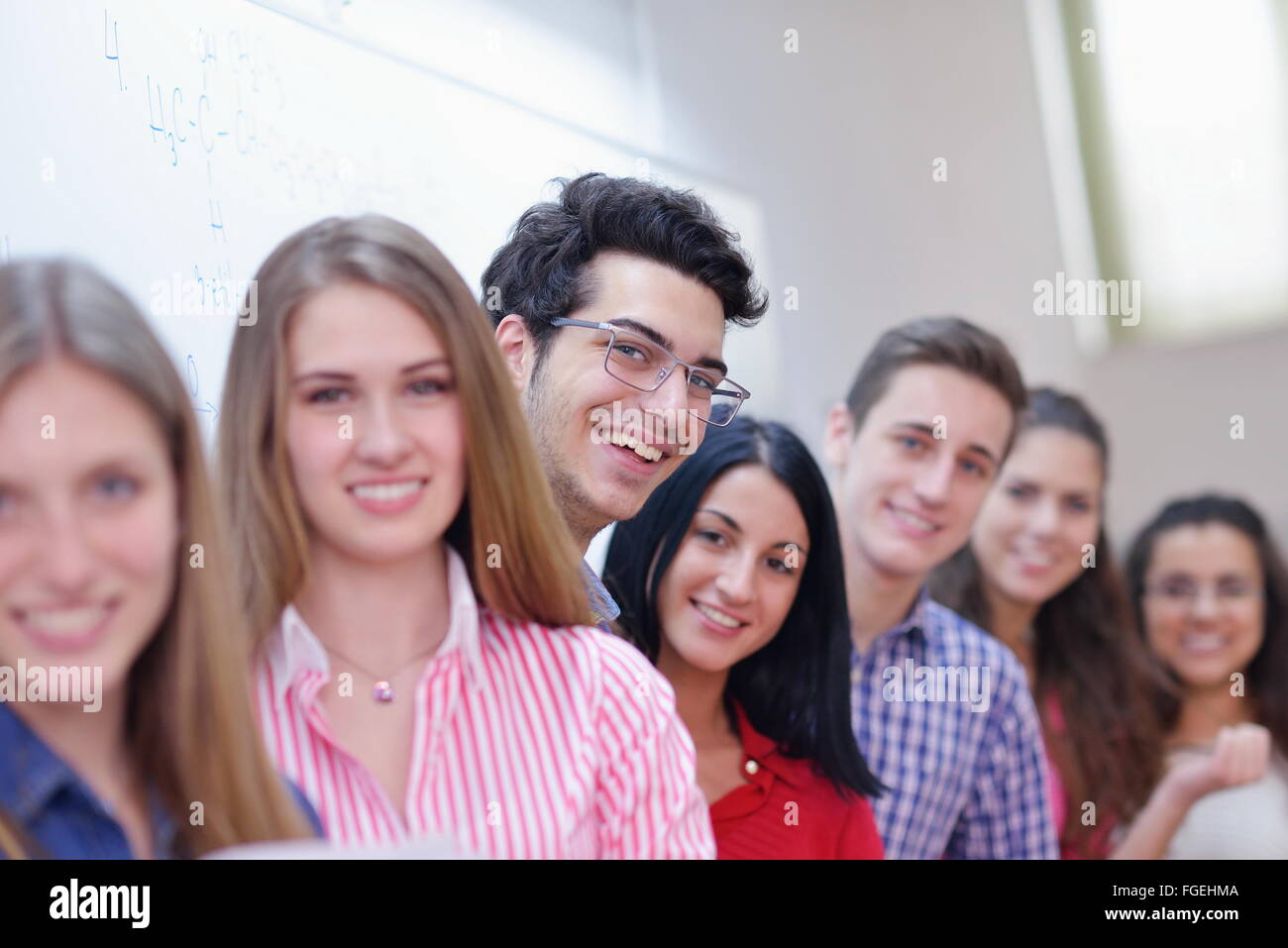 happy teens group in school Stock Photo - Alamy