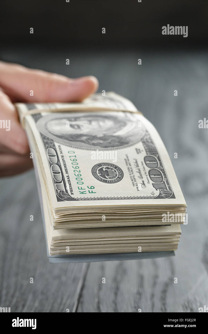 Real Stack Of Money In Hand