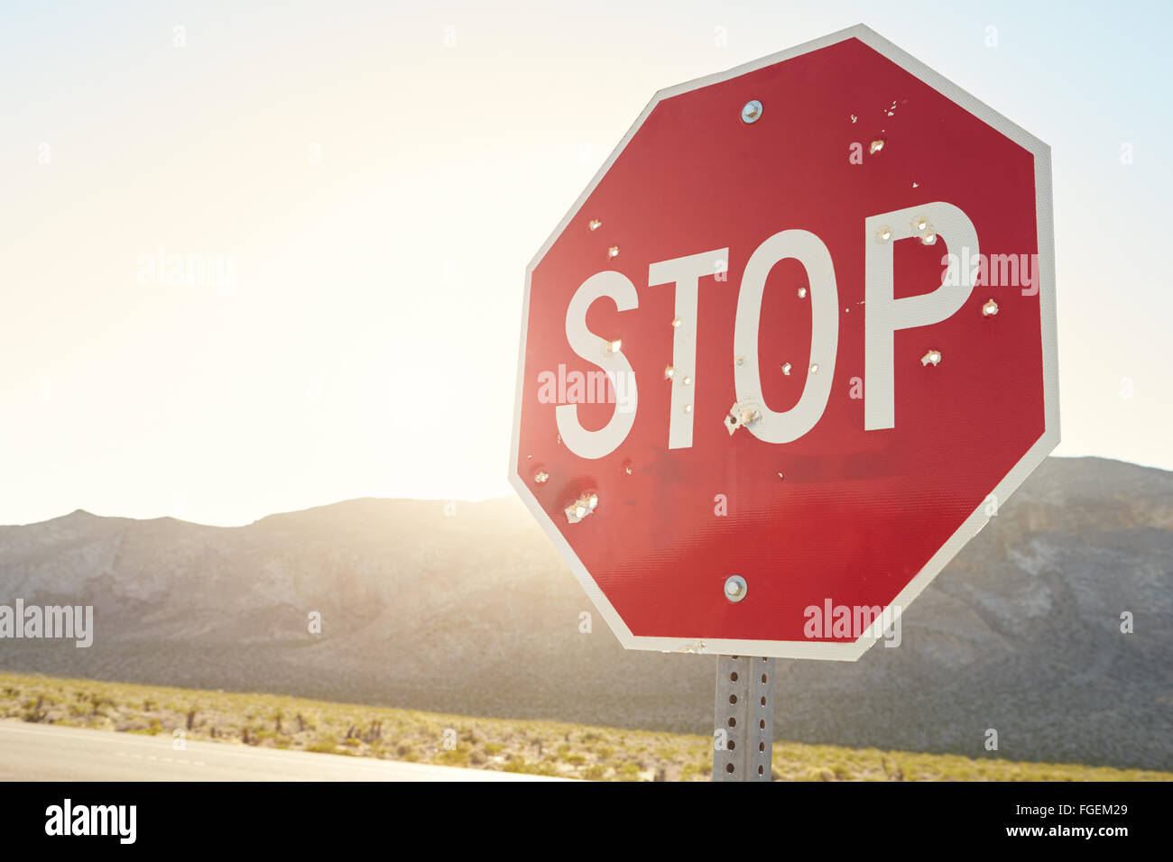 Bullet holes on traffic sign hi-res stock photography and images - Alamy