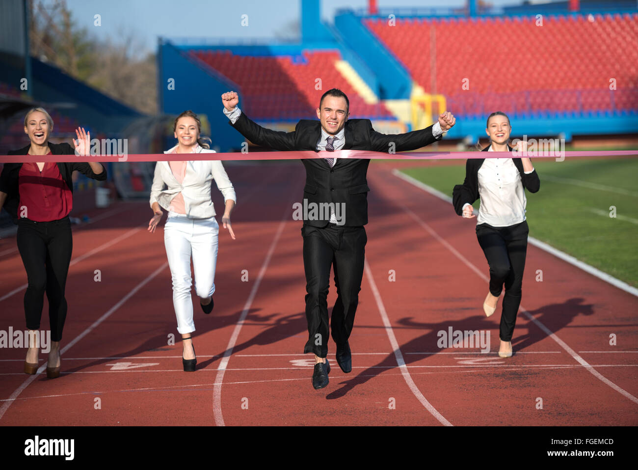 business people running on racing track Stock Photo - Alamy