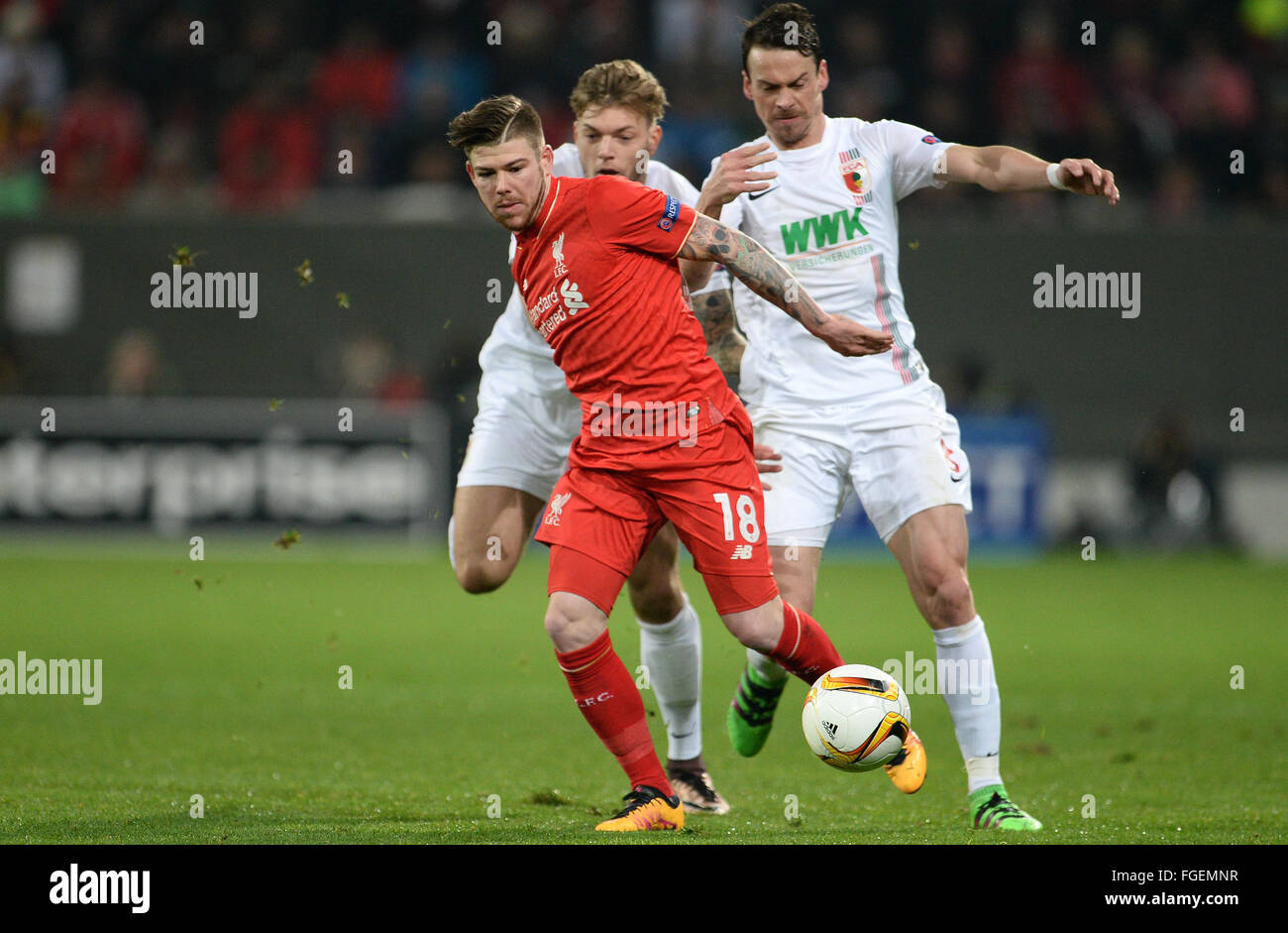 Augsburg, Germany. 18th Feb, 2016. Liverpool's Alberto Moreno (front ...
