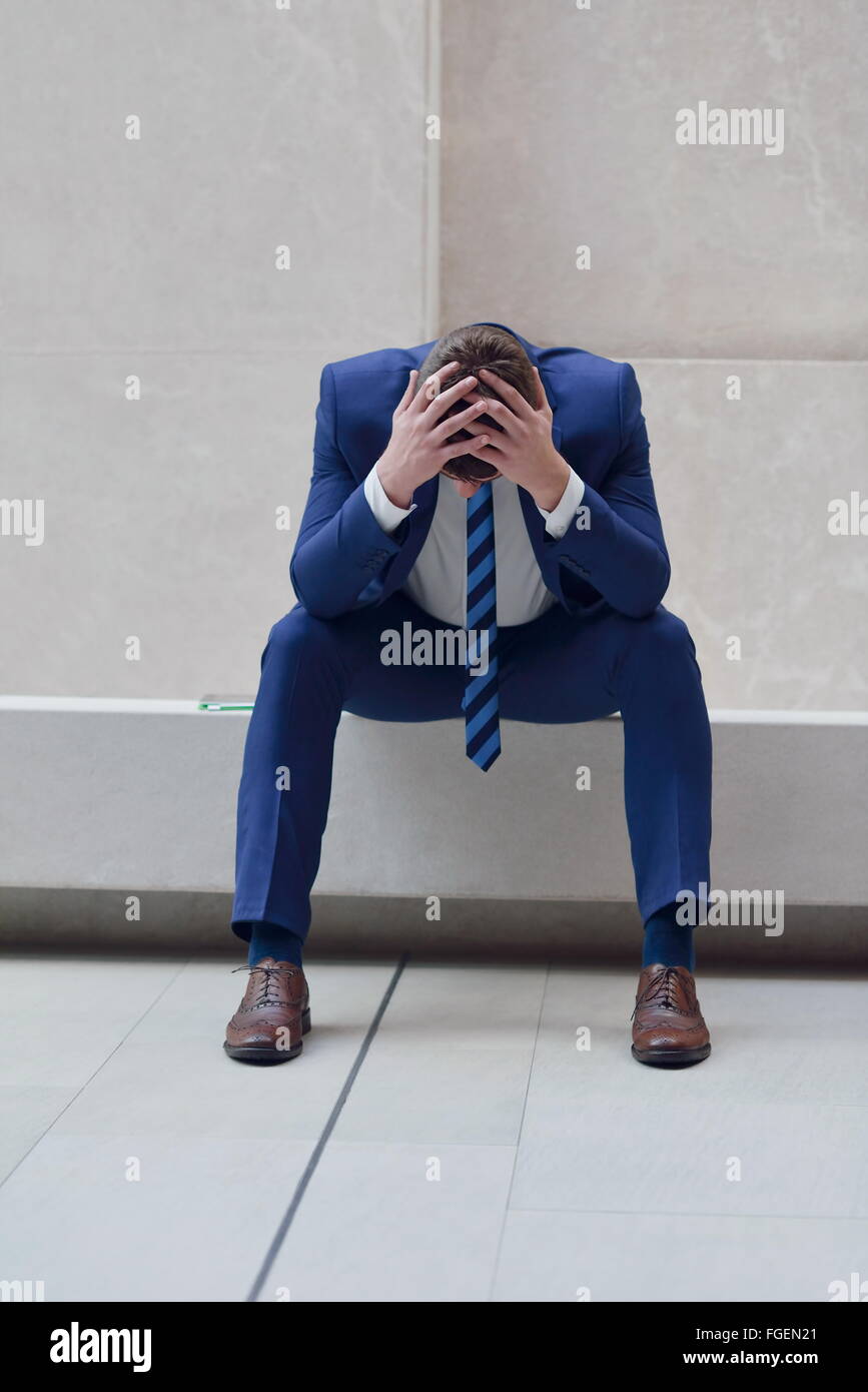 frustrated young business man Stock Photo - Alamy