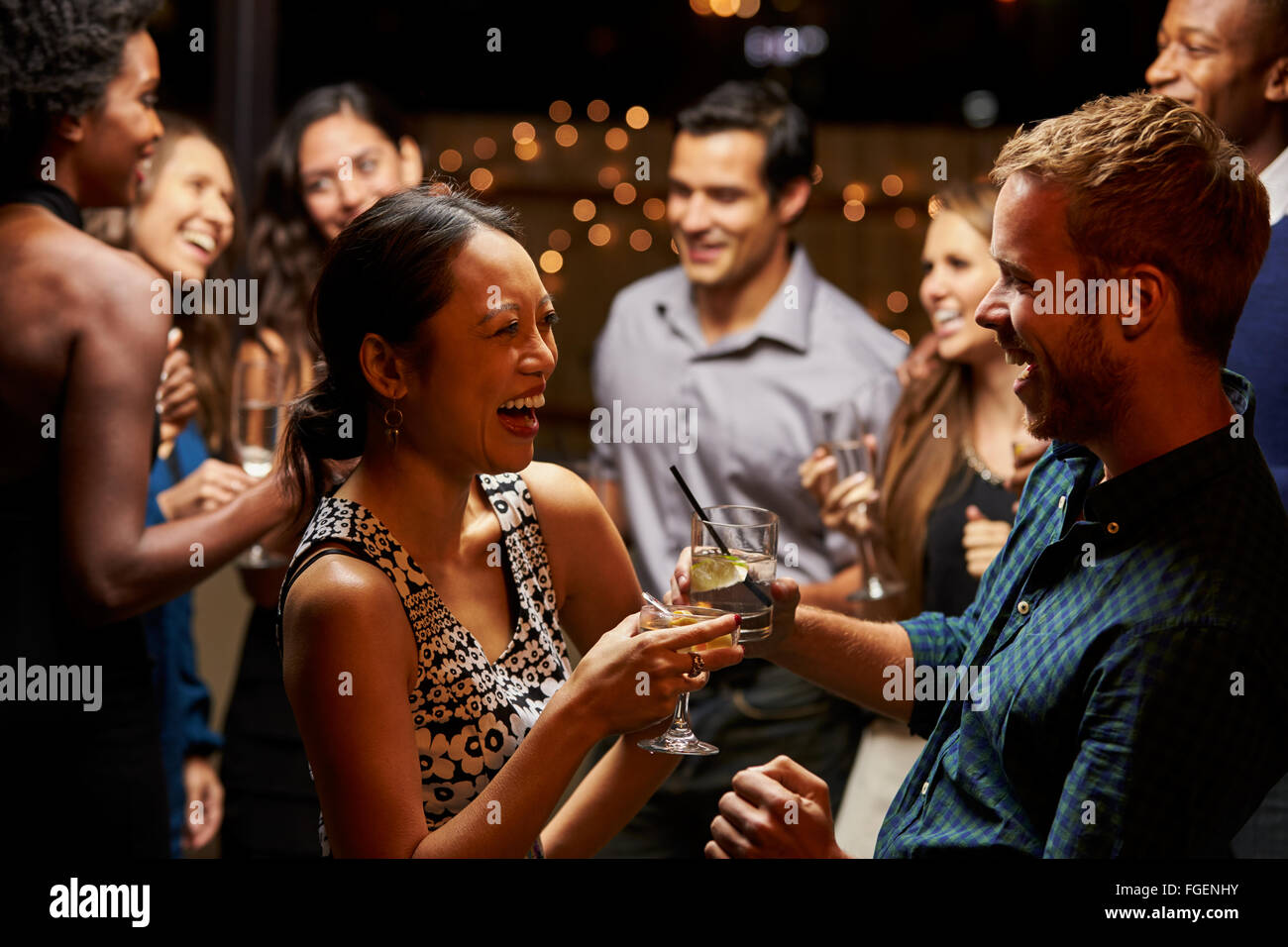 Couples Dancing And Drinking At Evening Party Stock Photo - Alamy