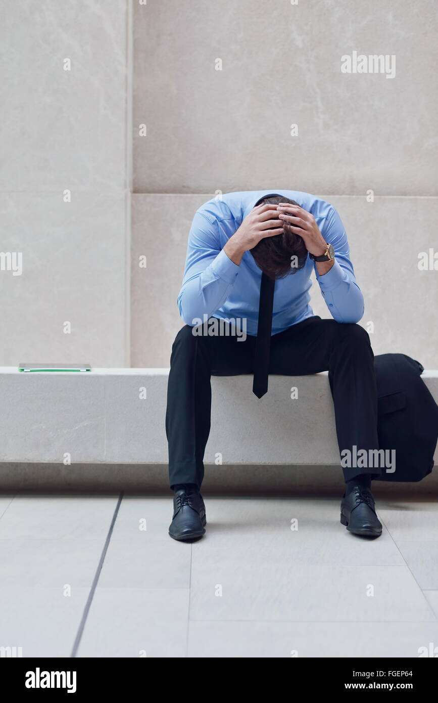 frustrated young business man Stock Photo - Alamy