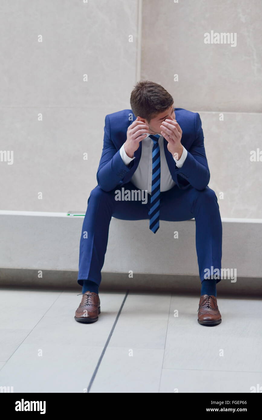 frustrated young business man Stock Photo - Alamy