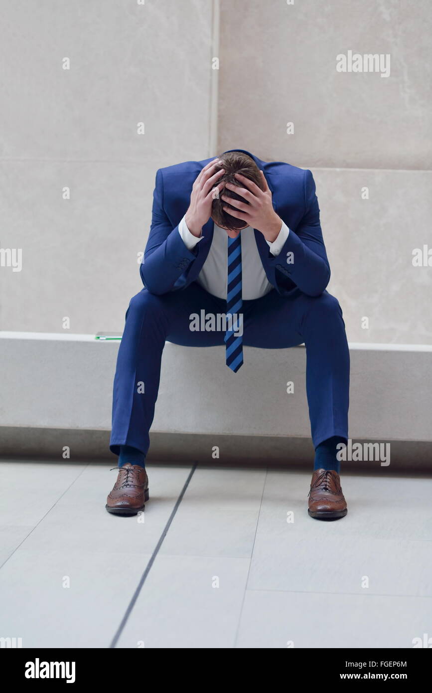 frustrated young business man Stock Photo - Alamy