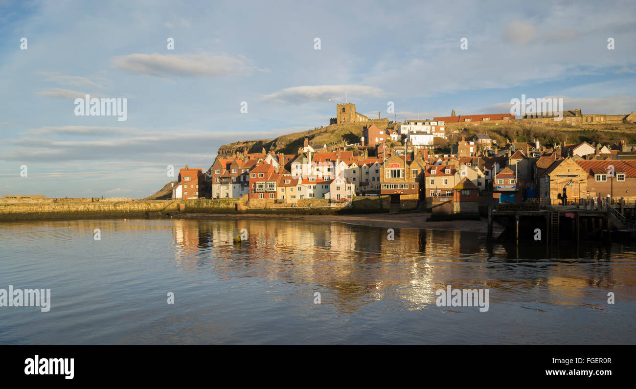 View over Whitby harbour during golden hour. Looking towards old town ...